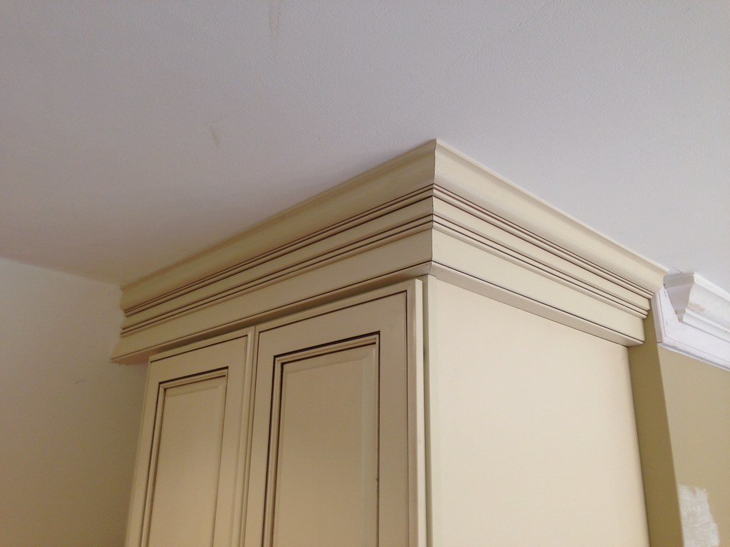Mastering the art of kitchen crown molding installation